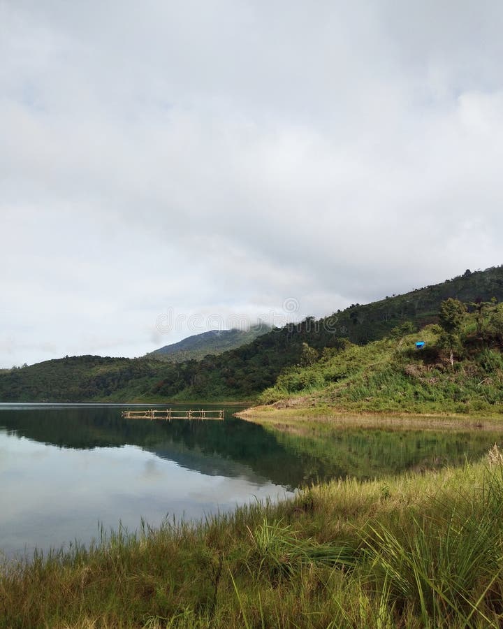 Talang Lake stock image. Image of reflection, highland - 261796011