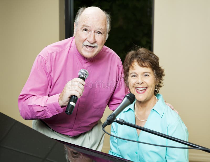 Talented Couple Sings Duet stock photo. Image of married - 15478274