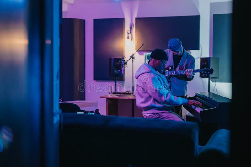 Talented Musicians Collaborating on Music Production in a Modern ...