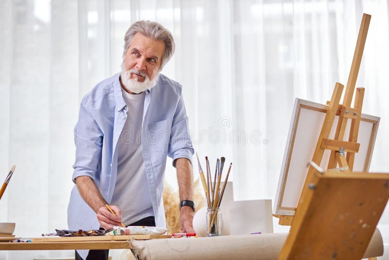 Talented and Skilled Caucasian Artist during Work Stock Photo - Image ...