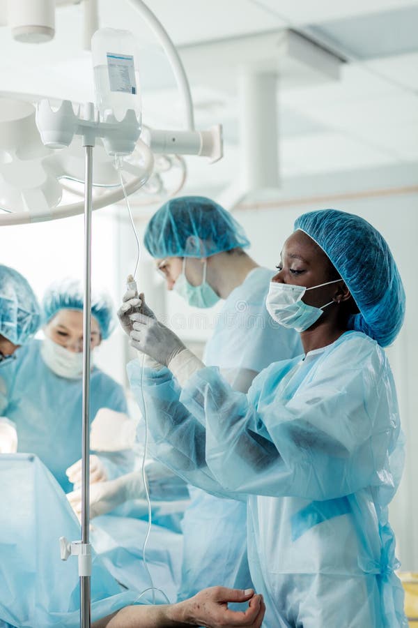 Talented Skilled Doctors Perform a Successful Procedure. Stock Photo ...