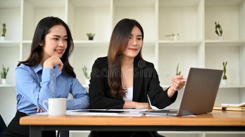 Talented Two Asian Office Employee Workers Working on Their Project ...