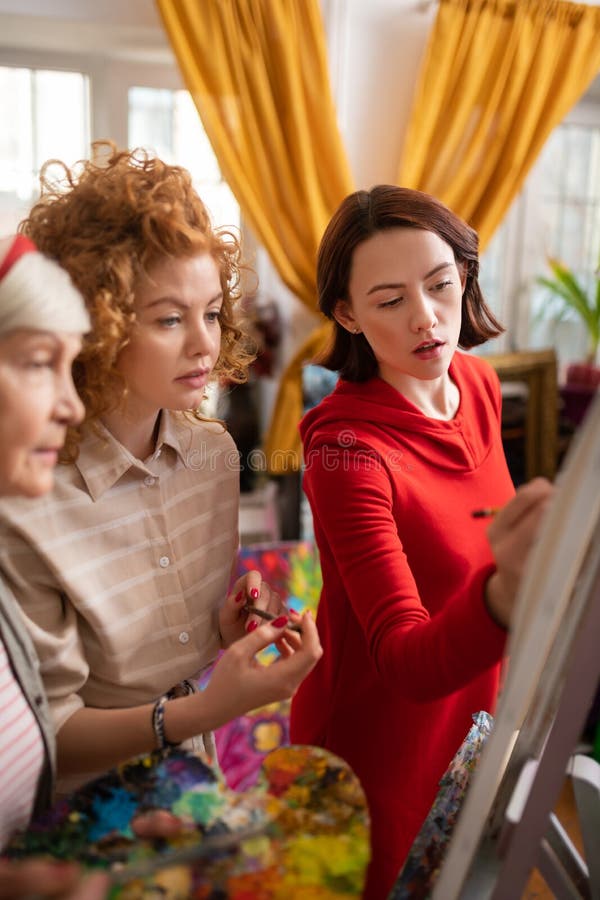 Talented Women Feeling Inspired while Painting Together Stock Photo ...