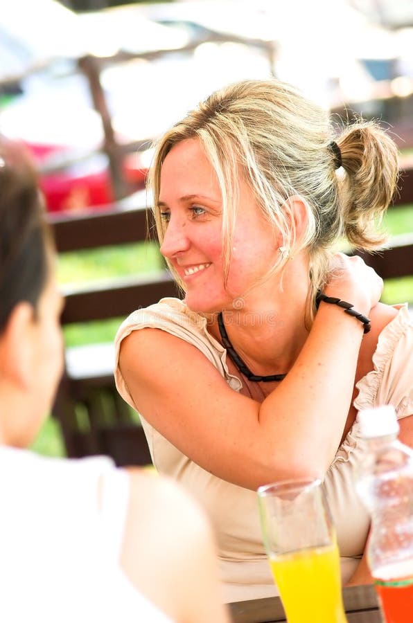 Talk in a cafe stock photo. Image of green, lady, house - 1181196