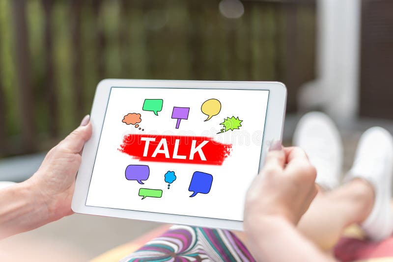 Talk concept on a tablet stock photo. Image of media - 82711844
