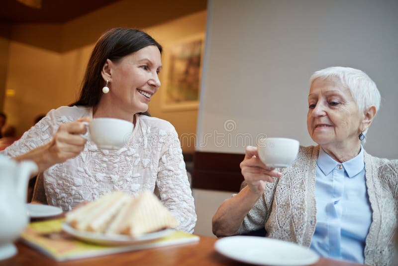 Talk by tea stock photo. Image of friendly, leisure, cafeteria - 87444516