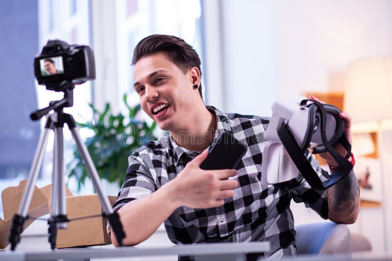 Talkative Good-looking Man in Checkered Shirt Explaining ...