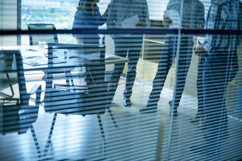 Talking collegues stock image. Image of colleague, room - 72340181