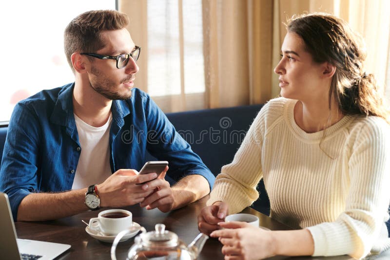 Talking by cup of tea stock photo. Image of discussing - 140893770