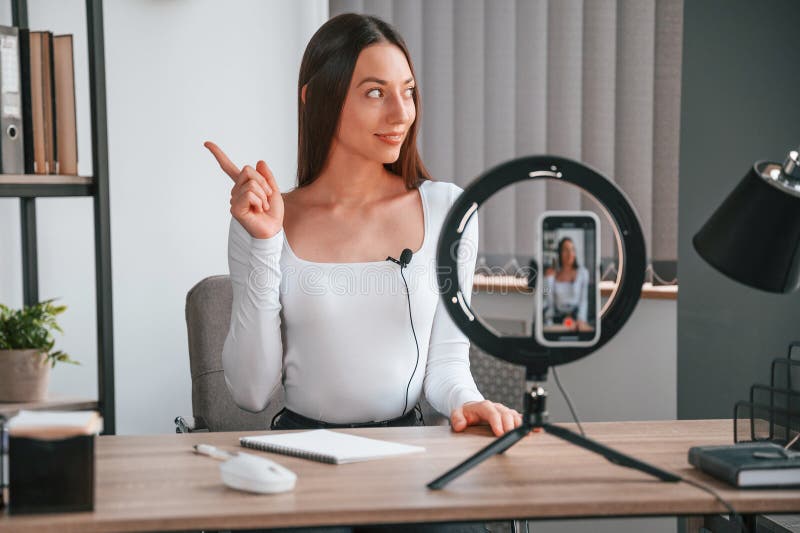 Talking, Doing Online Master Class. Young Beautiful Woman in White ...