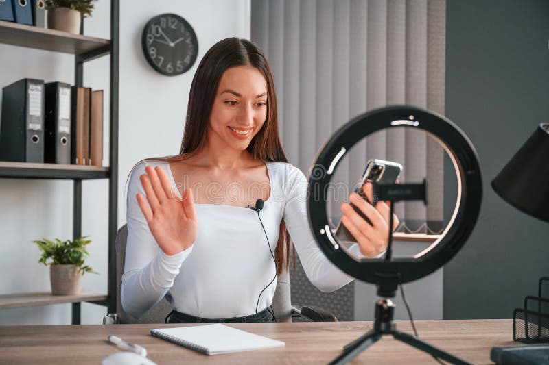 Talking, Doing Online Master Class. Young Beautiful Woman in White ...