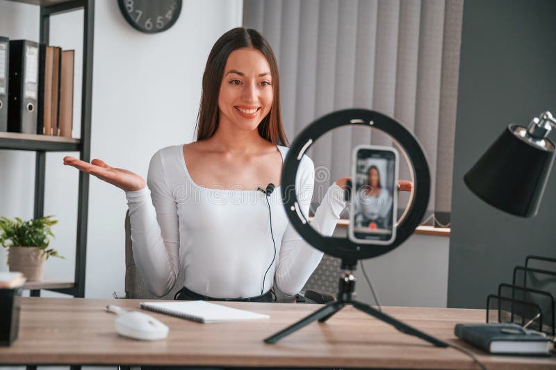 Talking, Doing Online Master Class. Young Beautiful Woman in White ...