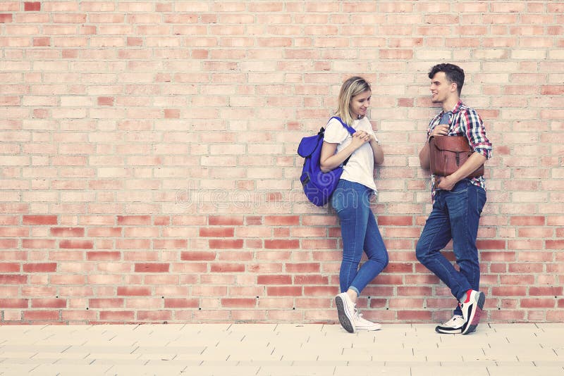 Two Talking German Male and Female Students Stock Image - Image of ...