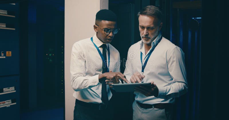 Talking, Inspection and Men in Server Room on Tablet for Network ...