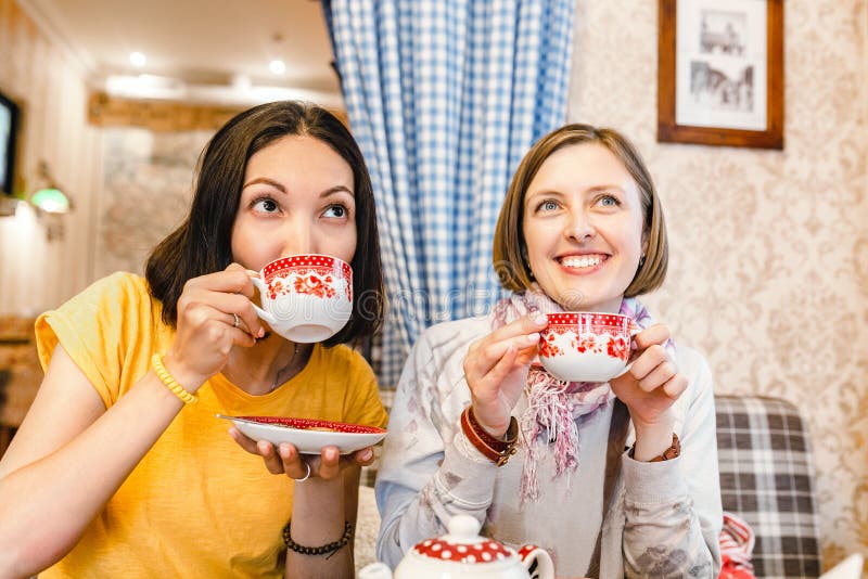 Talking and Laughing while Having Cup of Tea Stock Photo - Image of ...