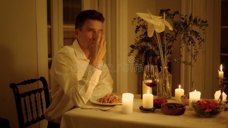 Talking Man Eating At Served Evening Table Close Up Gesturing Guy