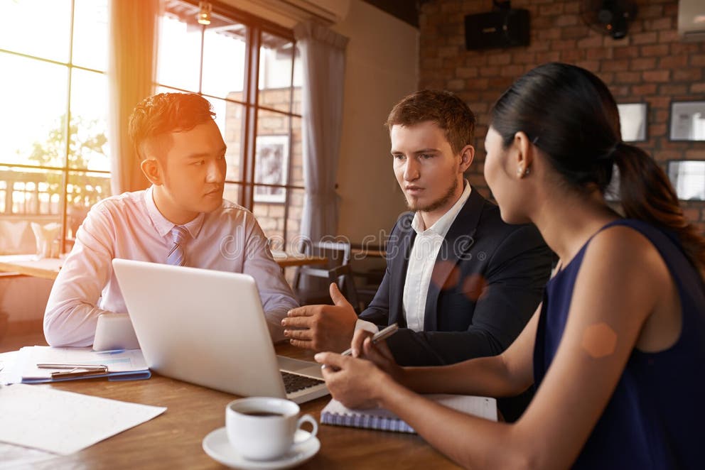 Talking about new strategy stock photo. Image of colleague - 103050840