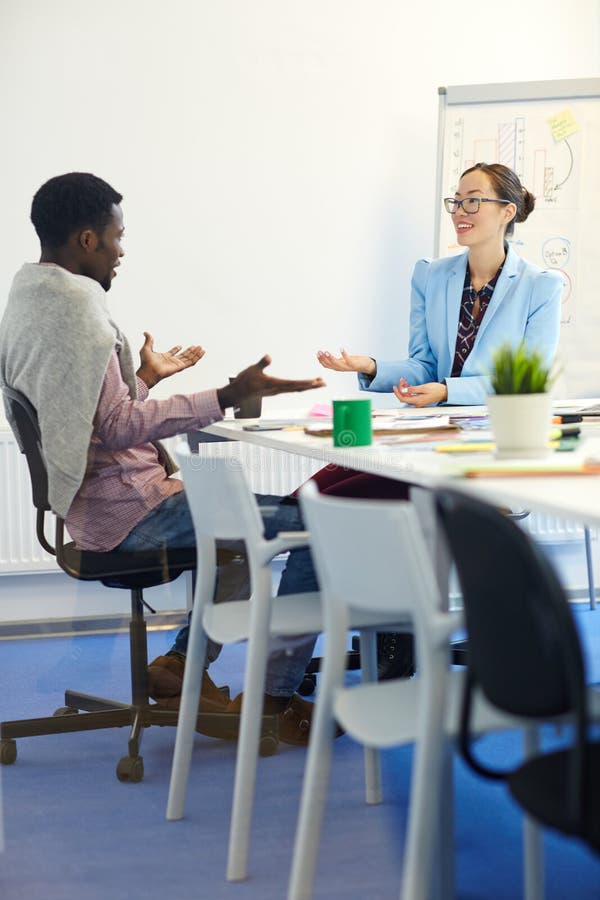 Talking in office stock image. Image of colleague, businesspreparation ...
