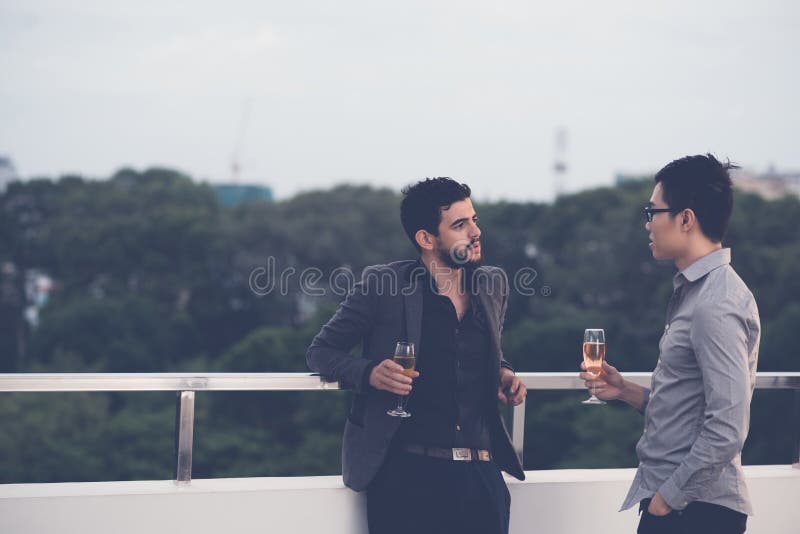 Talking at the party stock image. Image of talking, multiethnic - 56436695
