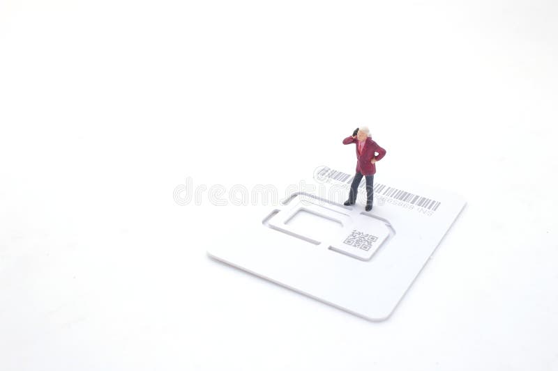 A Talking on the Phone, the Figure Stand on the Sim Card Stock Photo ...