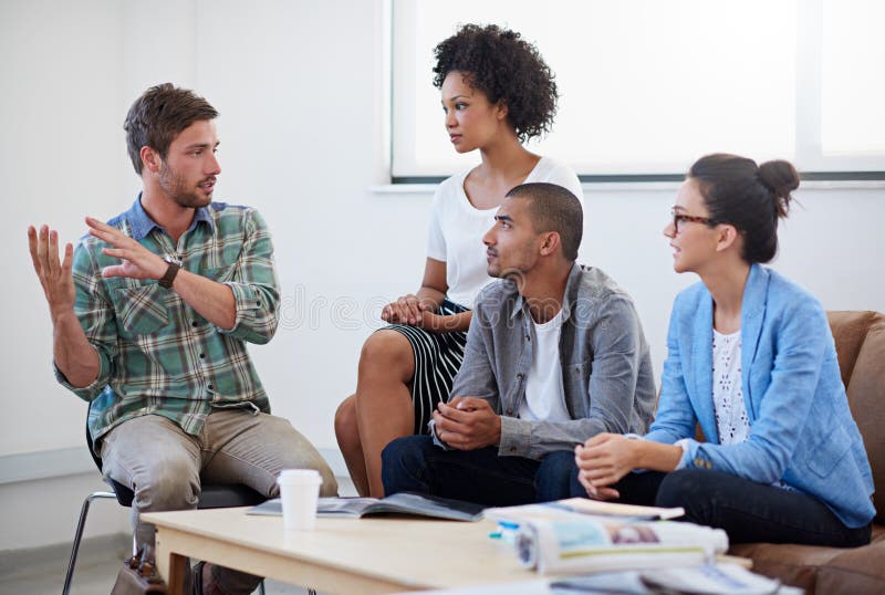Talking Points. a Diverse Group of Designers Having a Meeting Around a ... Talking Points. a Diverse Group of Designers Having a Meeting Around a ...