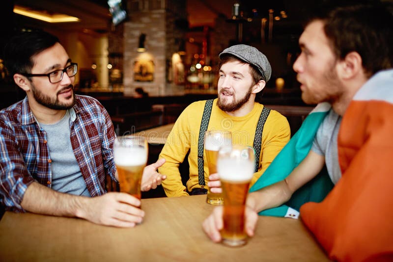 Talking in pub stock image. Image of talking, lager, pint - 66065325