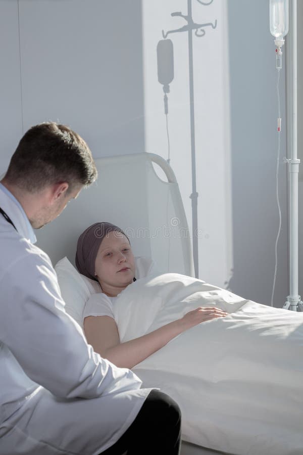 Talking with sick patient stock photo. Image of doctor - 59572812