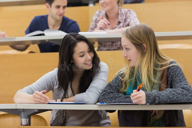 Students Learning in a Lecture Hall with One Girl Using Tablet Pc Stock ...