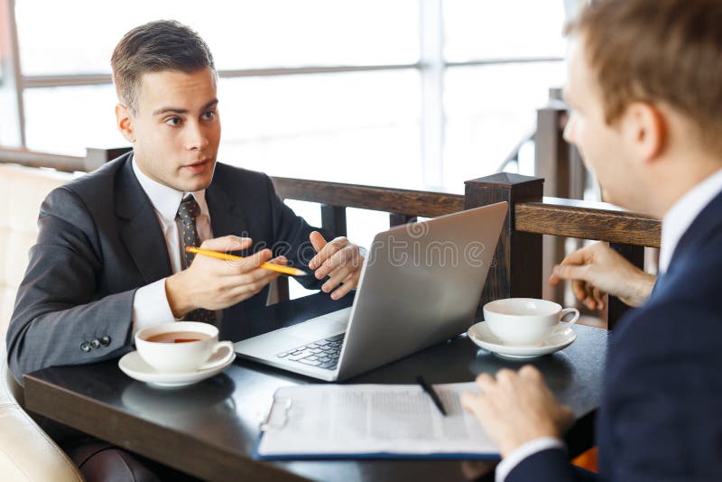 Talking to colleague stock photo. Image of talking, coworking - 84833332