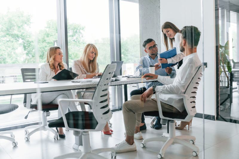 Talking and Working on the Project Together. Group of Professional ...