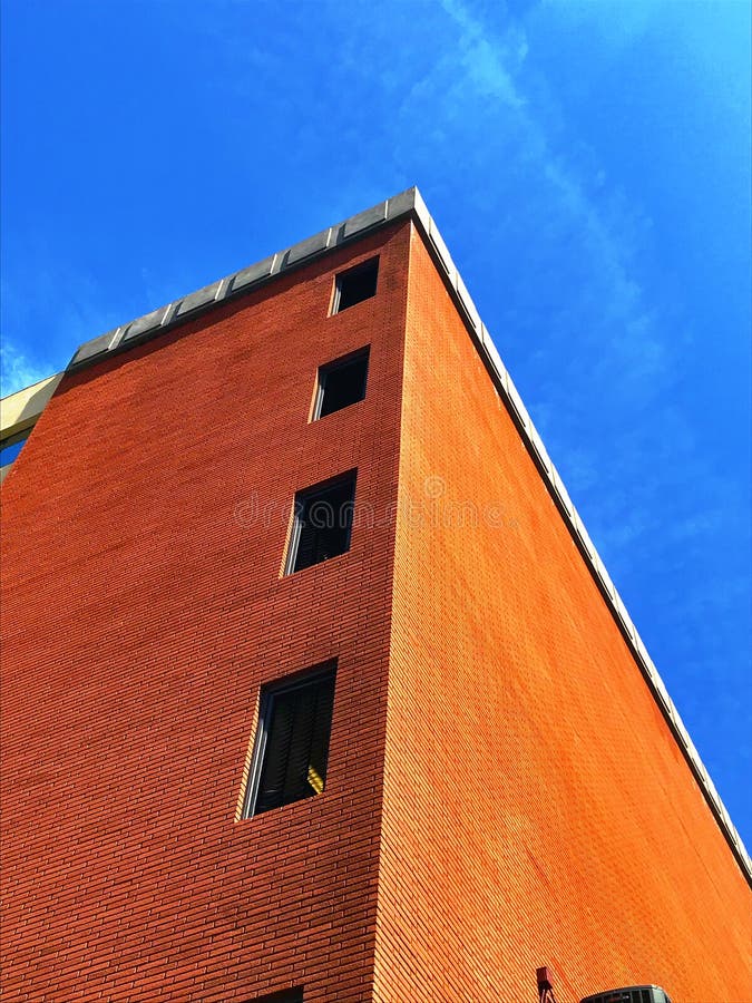Tall brick building stock image. Image of urban, lowangleview - 215468385