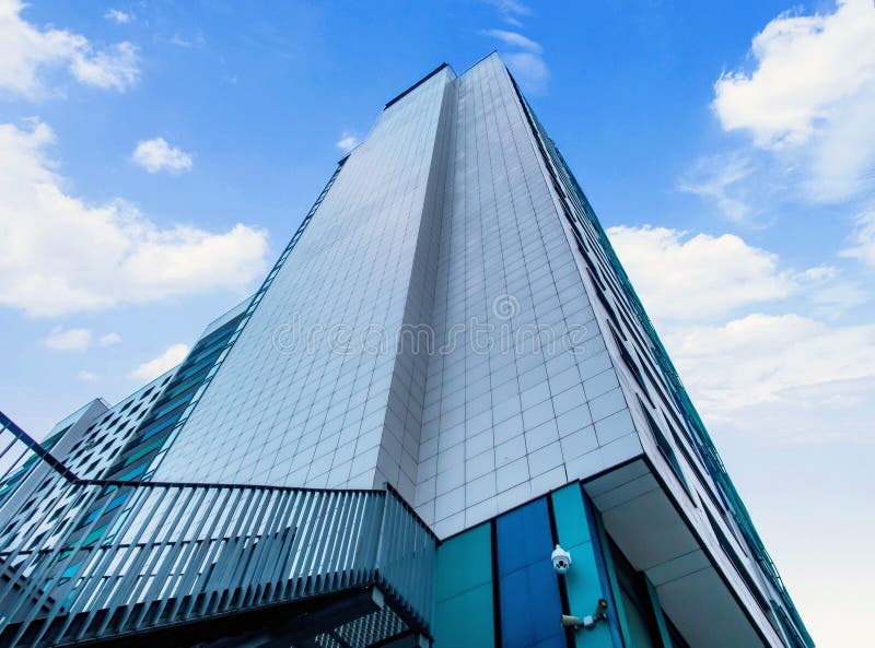 Tall Building Against the Sky, View from Below Stock Photo - Image of ...