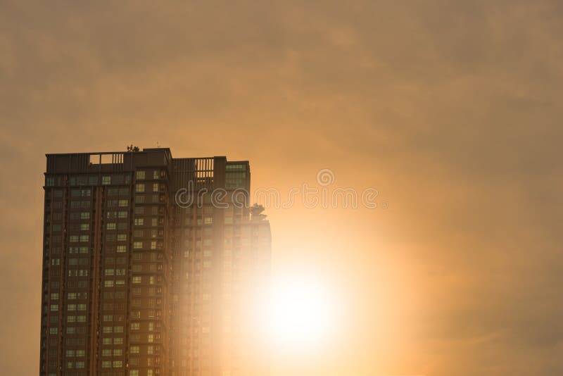 Tall Building on Dawn Sky Background with Sunlight Stock Photo - Image ...