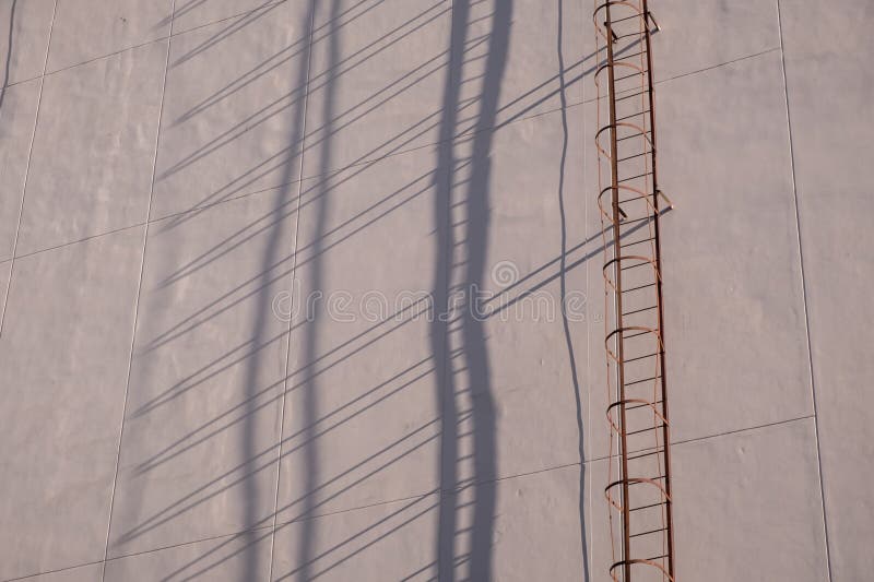 Close Up Building Facade with Ladder and Shadows Stock Image - Image of ...