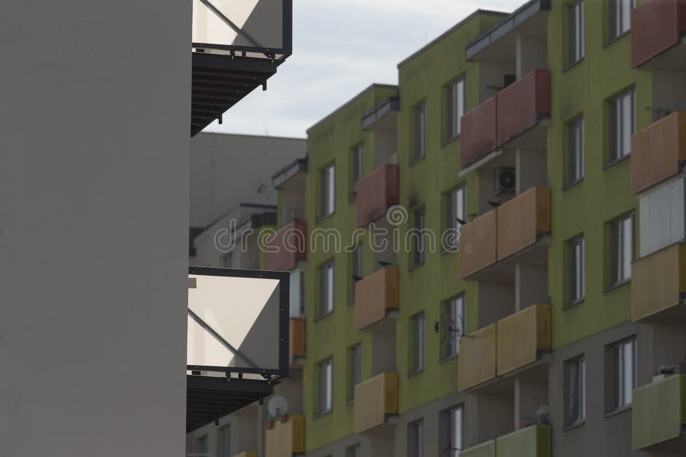 A Tall Building that Features Numerous Windows and Multiple Balconies ...