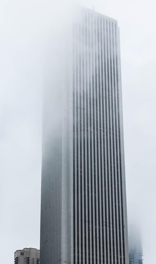 Tall Building into Fog stock photo. Image of reflection - 49695048