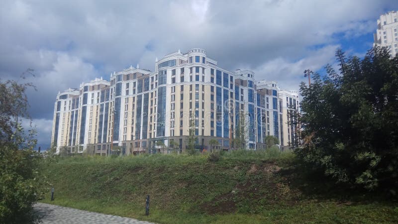 Tall Building with Large Windows in the City Center Stock Photo - Image ...