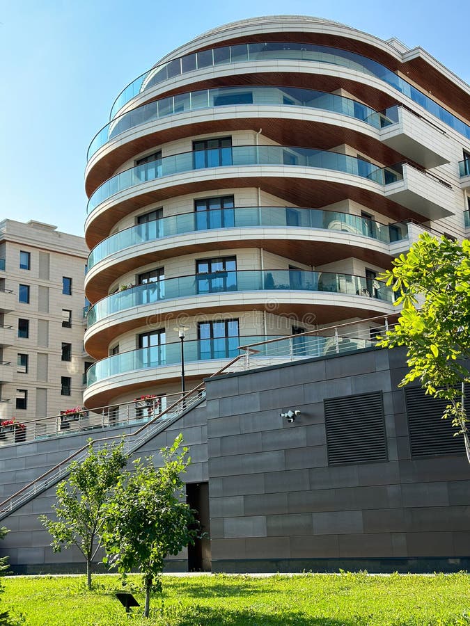 Tall Building with a Lot of Windows and Balconies Stock Photo - Image ...