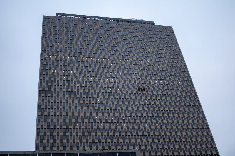 A Tall Building with Lots of Windows Near the Sky Line Editorial Stock ...