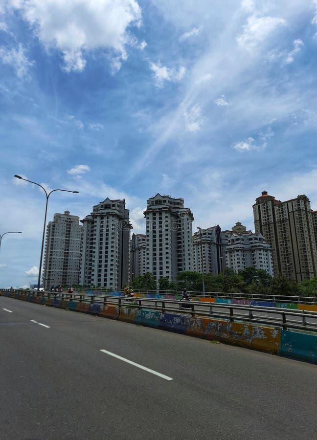 Tall Building in the Middle of the City Stock Image - Image of street ...