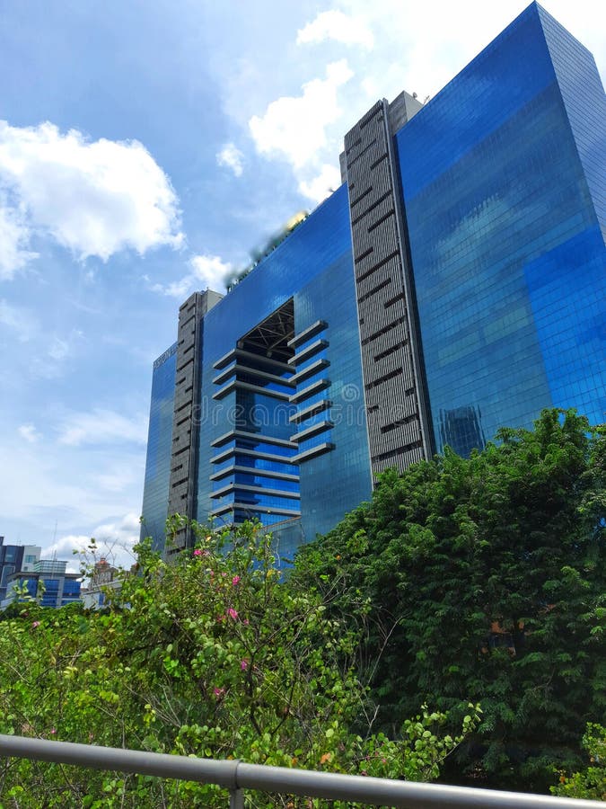 Tall Building in the Middle of the City Stock Photo - Image of facade ...
