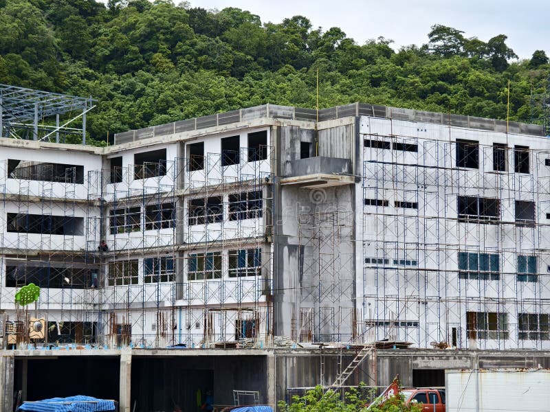 A Tall Building with Numerous Windows is Being Built Stock Photo ...