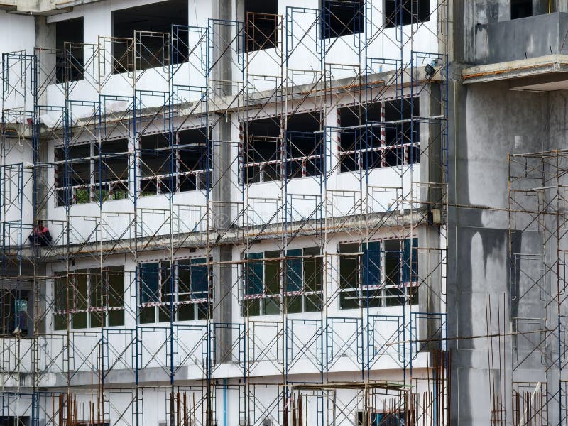 A Tall Building with Numerous Windows is Being Built Stock Image ...