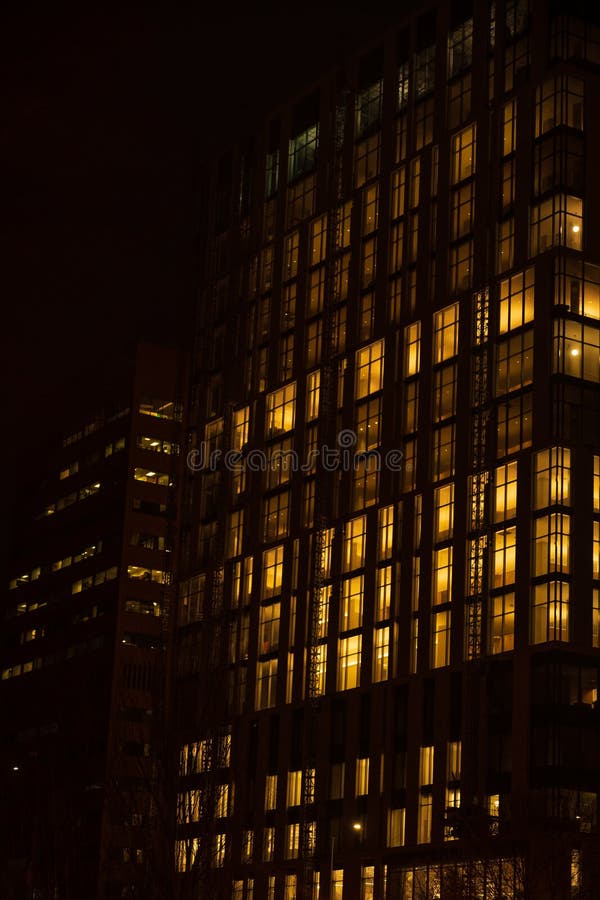Tall Building, Skyscraper, at Night, People at Work at the Office ...