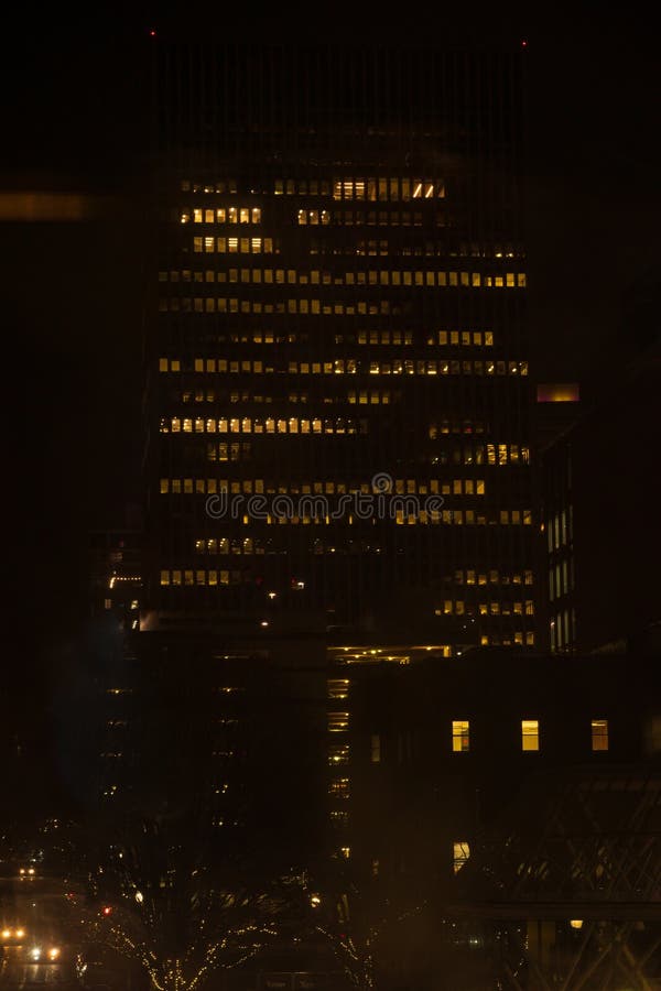 Tall Building, Skyscraper, at Night, People at Work at the Office ...