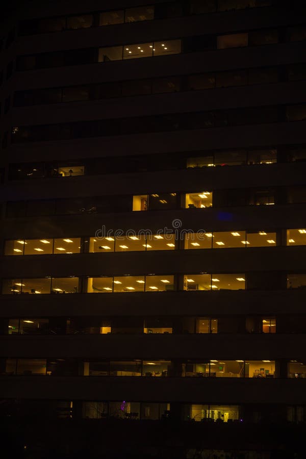 Tall Building, Skyscraper, at Night, People at Work at the Office ...