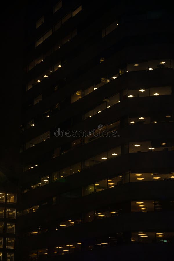 Tall Building, Skyscraper, at Night, People at Work at the Office ...