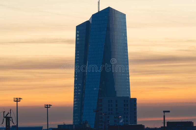 A Tall Building Towering Over a City Skyline at Sunset, Editorial ...