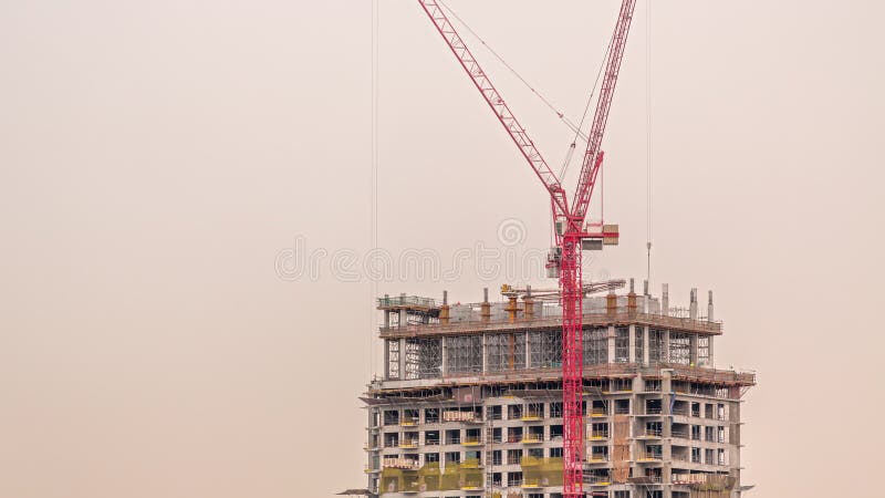 Tall Buildings Under Construction and Cranes Timelapse Stock Image ...
