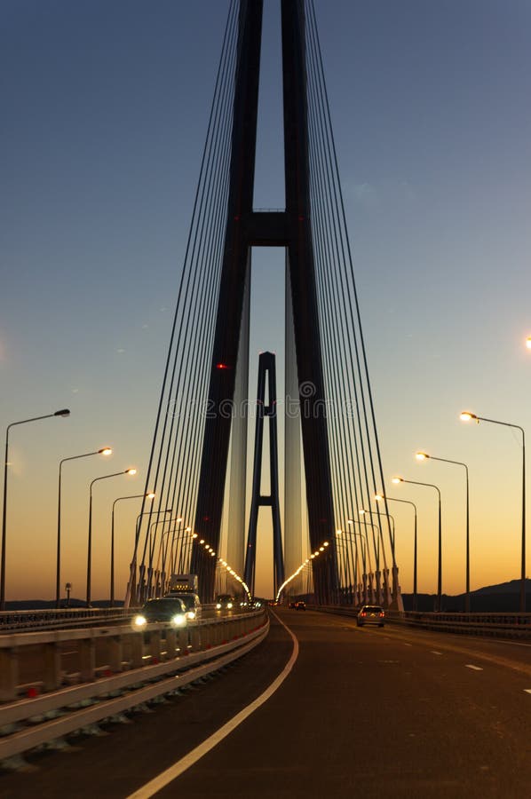 The Tall Cable-stayed Bridge on the Sunset Stock Photo - Image of ...